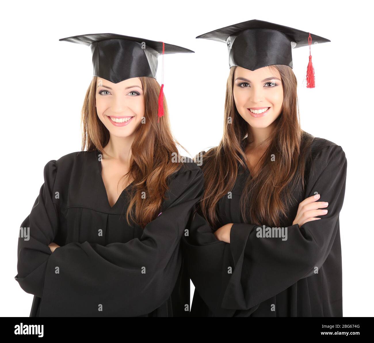 Two happy graduating students isolated on white Stock Photo - Alamy