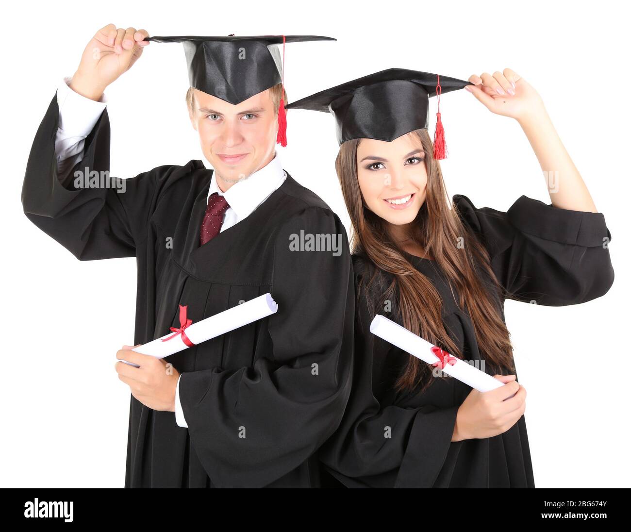 Two happy graduating students isolated on white Stock Photo - Alamy