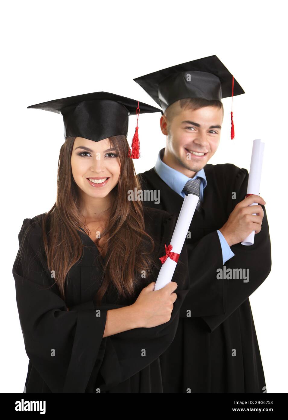 Two happy graduating students isolated on white Stock Photo - Alamy