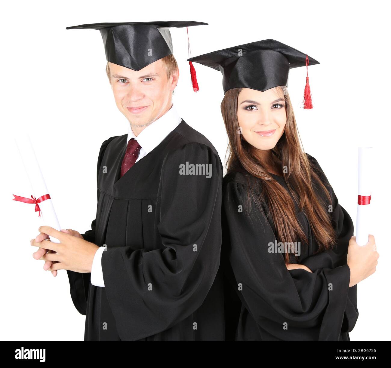 Two happy graduating students isolated on white Stock Photo - Alamy