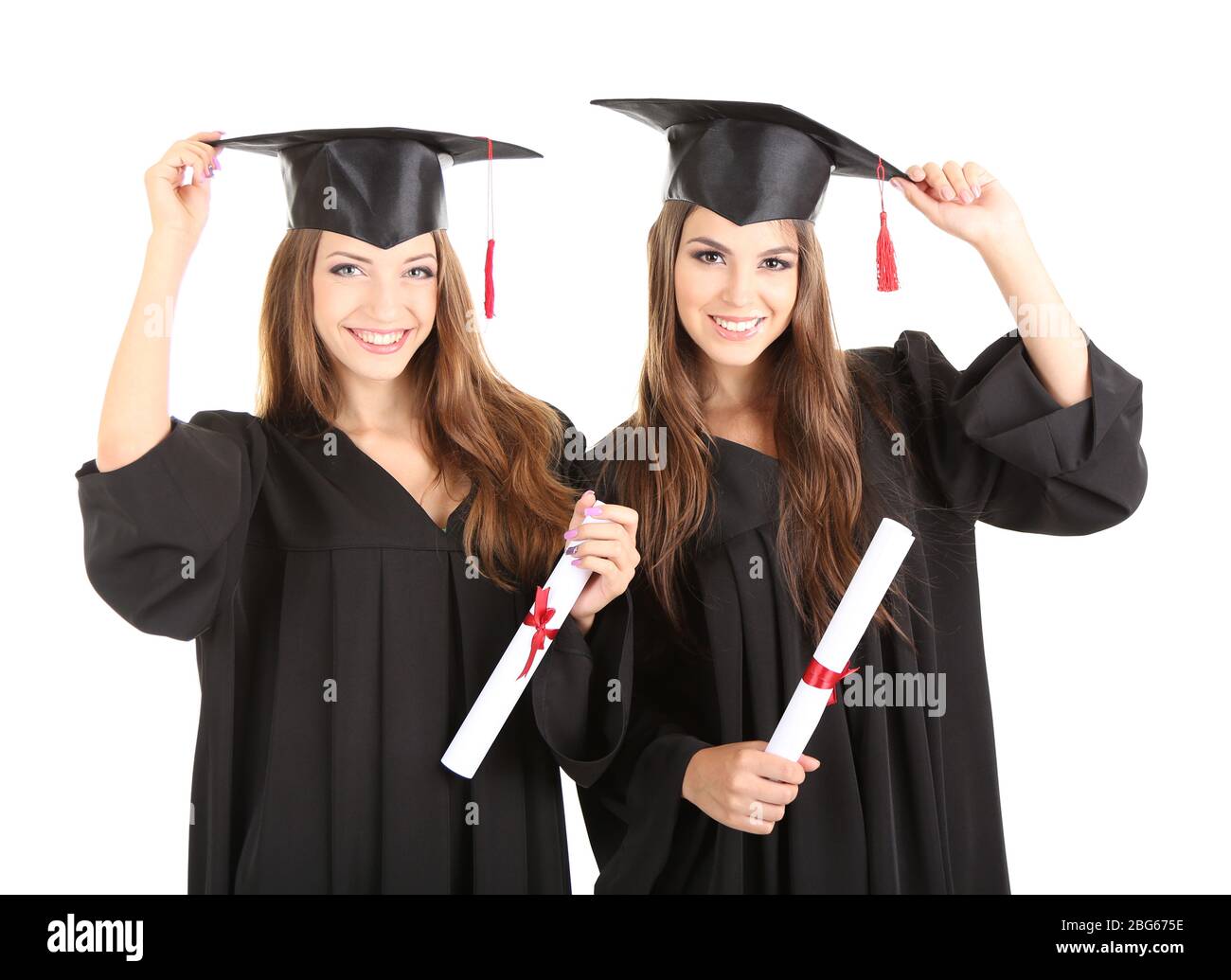 Two happy graduating students isolated on white Stock Photo - Alamy