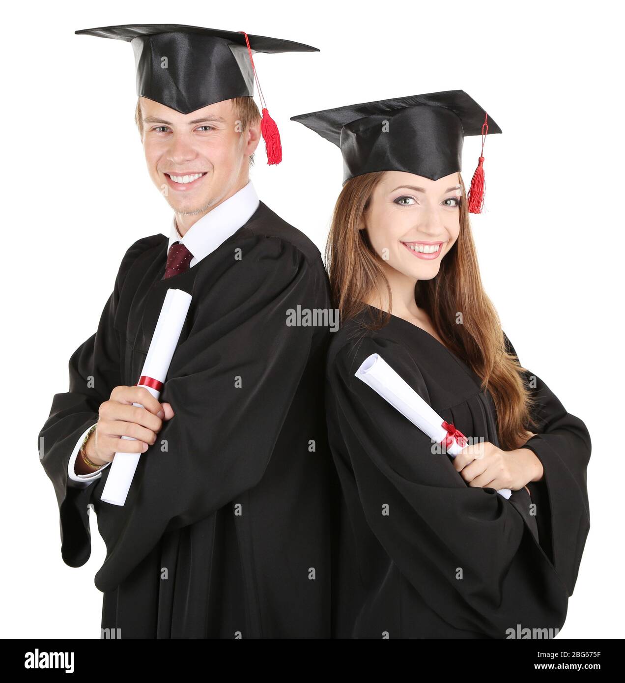 Two happy graduating students isolated on white Stock Photo - Alamy