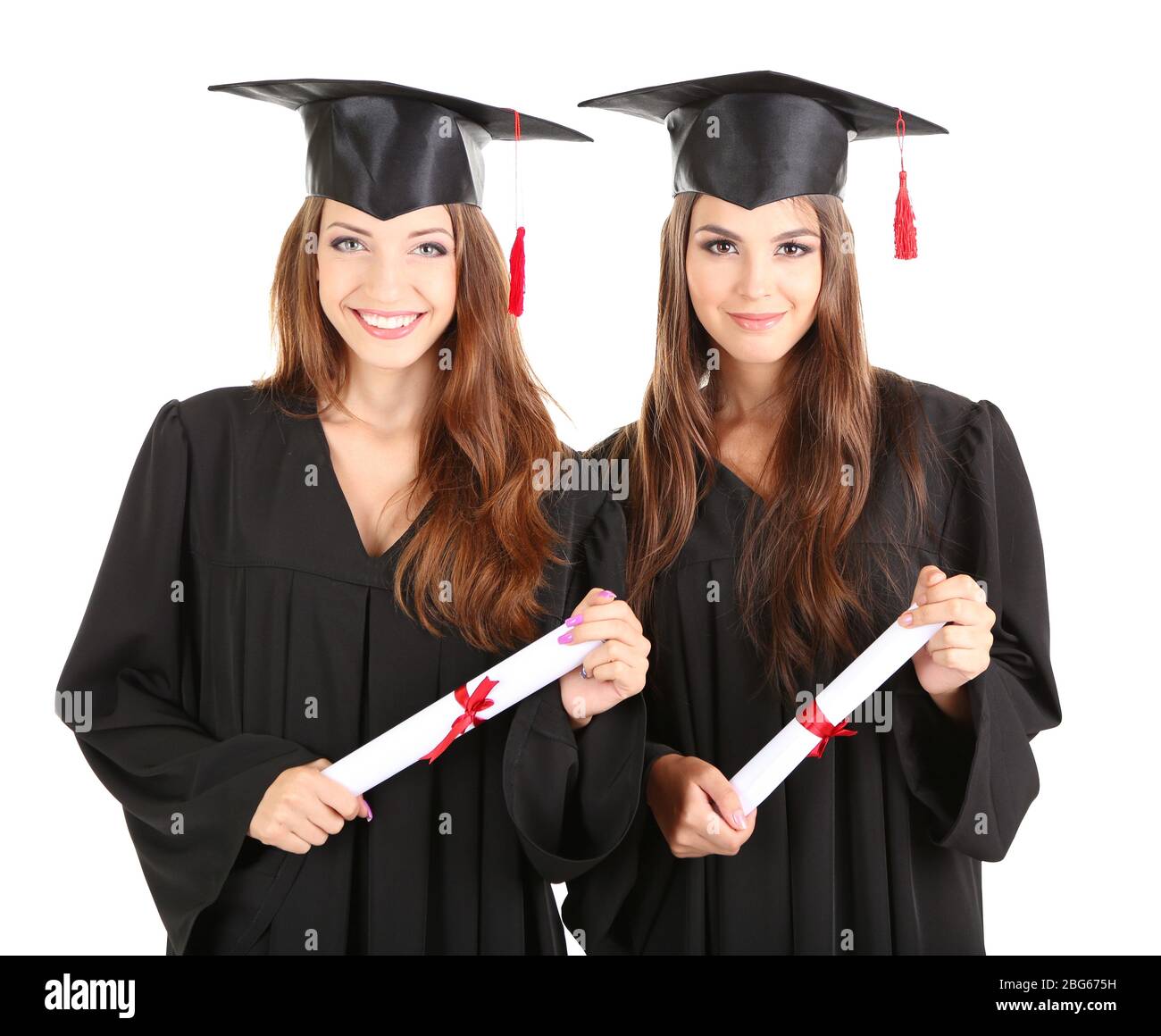 Two happy graduating students isolated on white Stock Photo - Alamy
