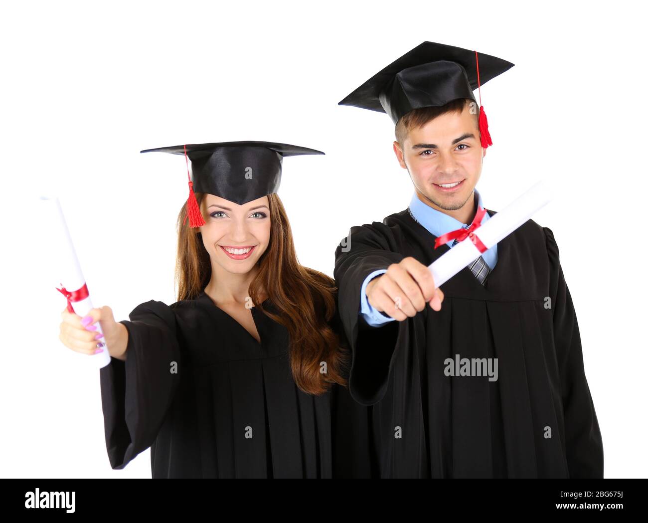 Two happy graduating students isolated on white Stock Photo - Alamy