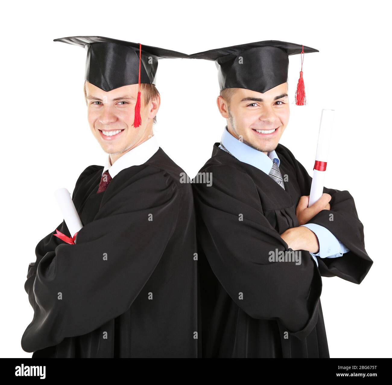 Two happy graduating students isolated on white Stock Photo - Alamy