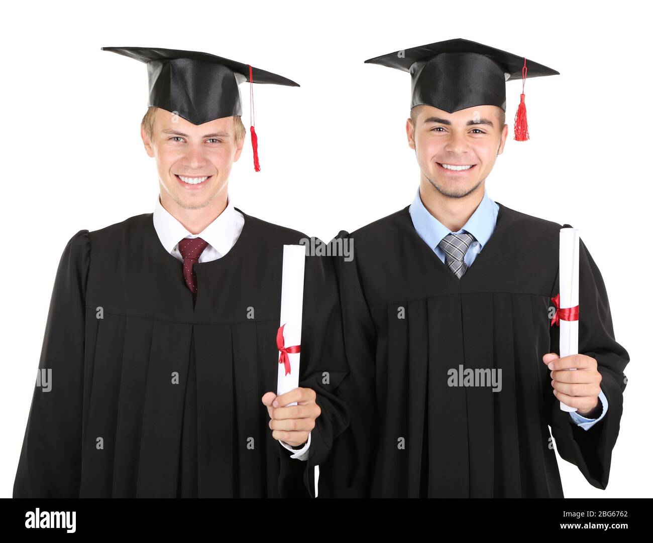Two happy graduating students isolated on white Stock Photo - Alamy