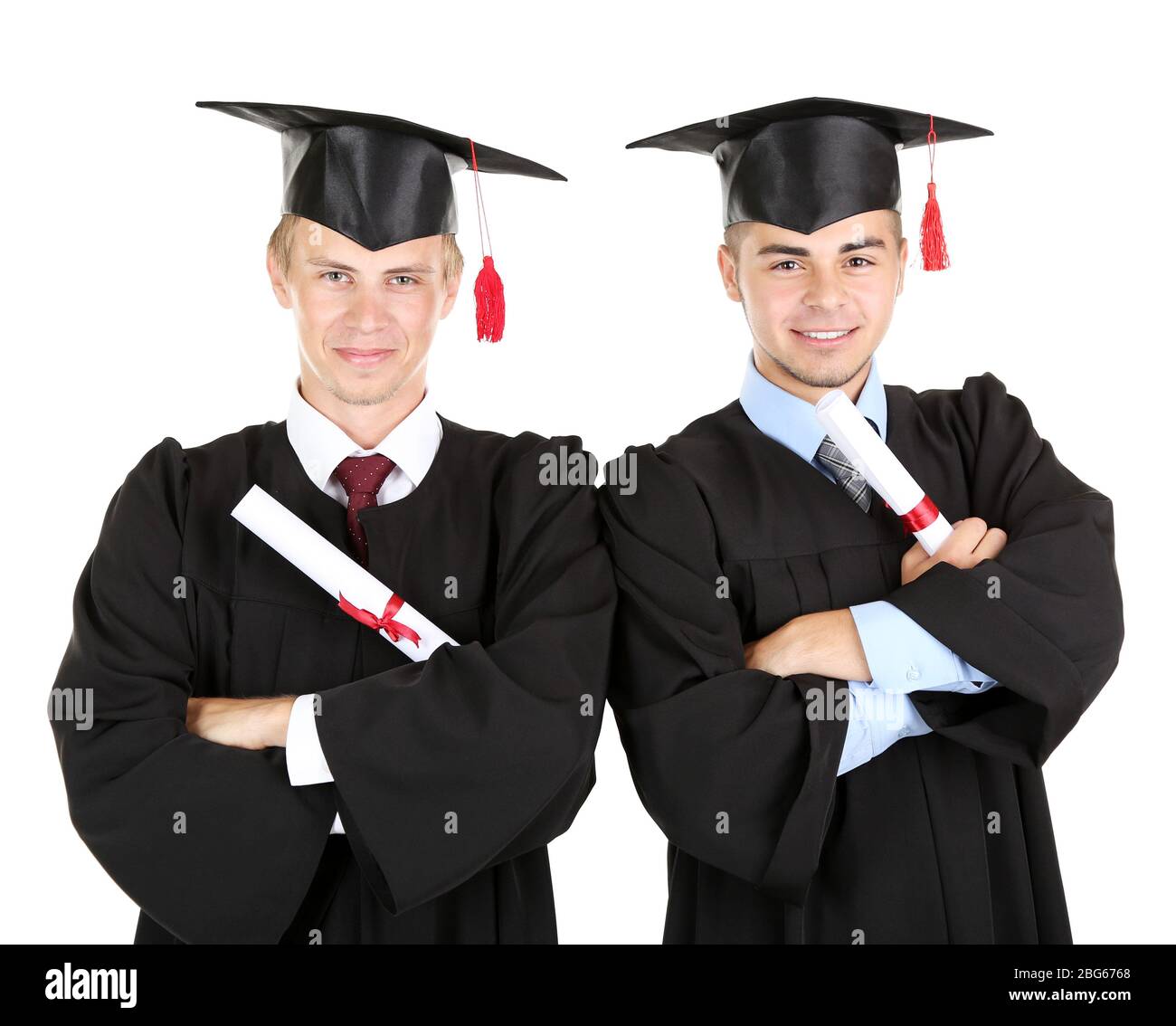 Two happy graduating students isolated on white Stock Photo - Alamy