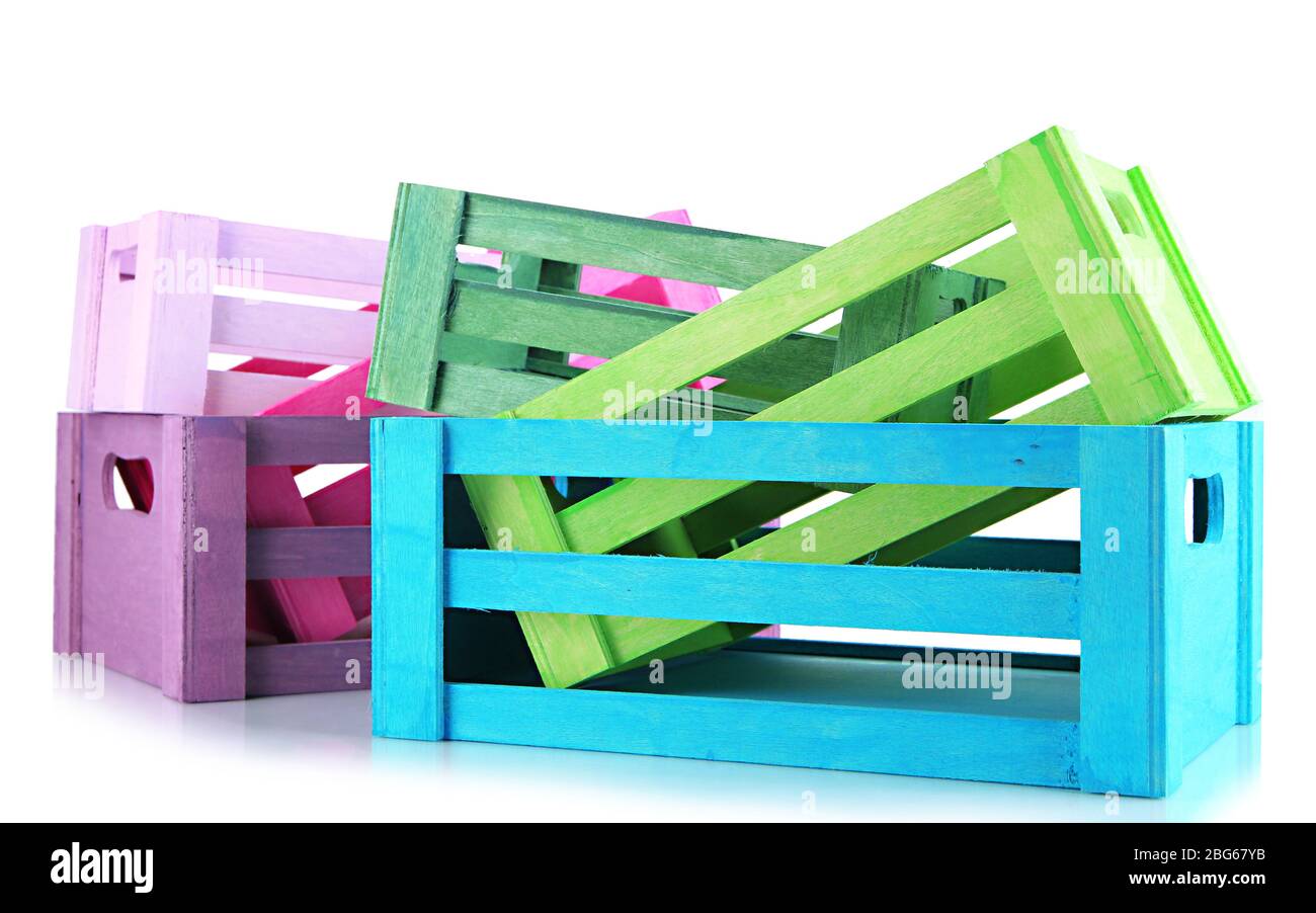 Color wooden crates, isolated on white Stock Photo - Alamy