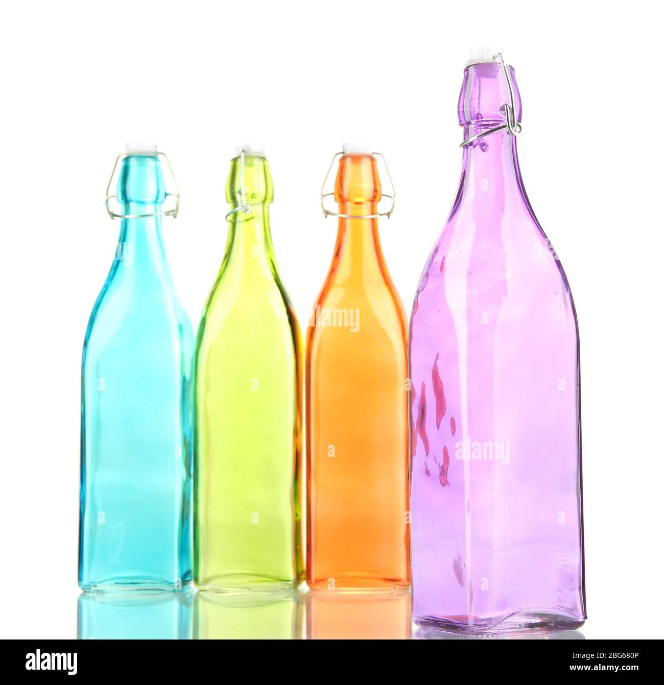 Empty color glass bottles, isolated on white Stock Photo - Alamy