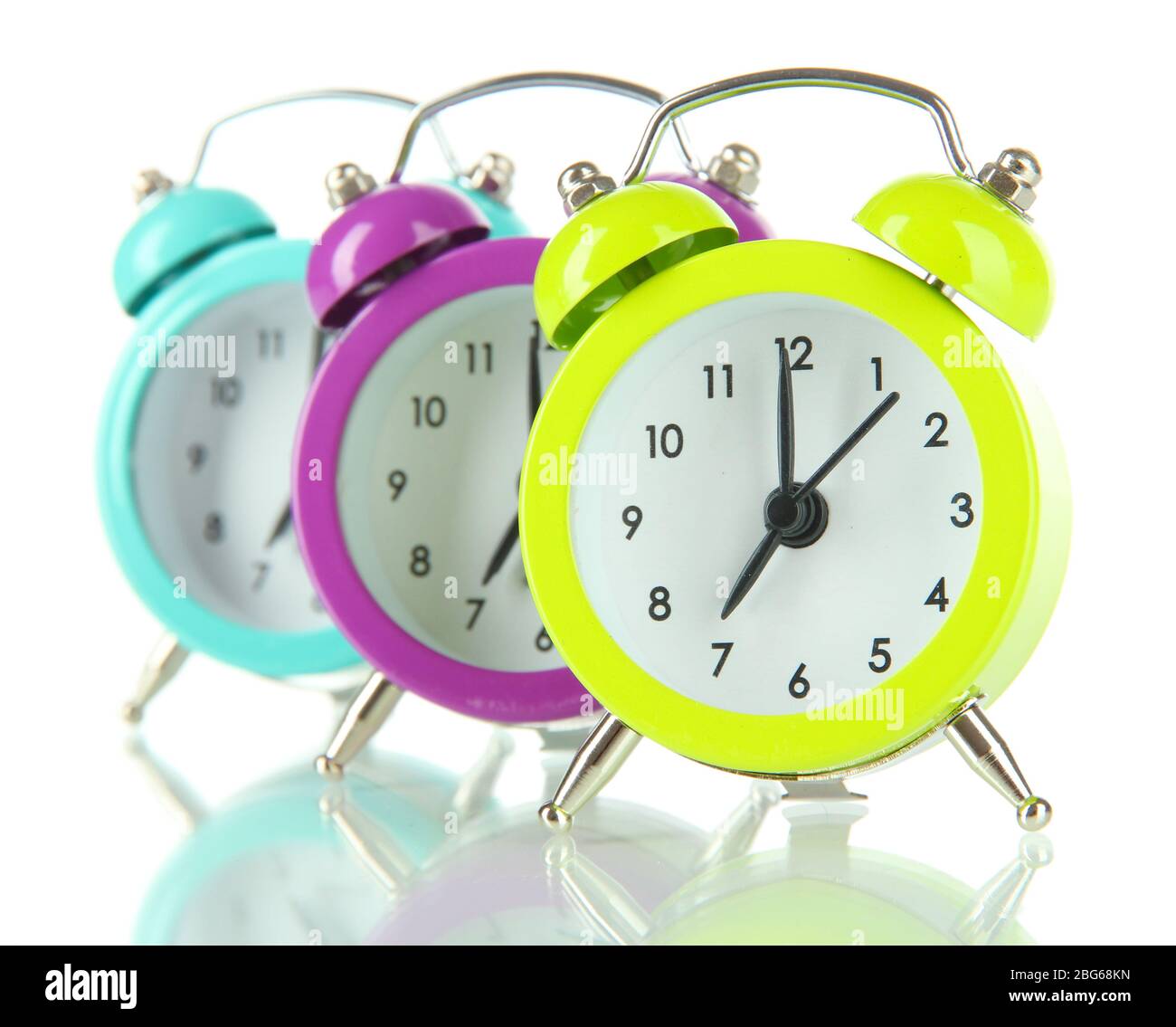 Colorful alarm clock isolated on white Stock Photo - Alamy
