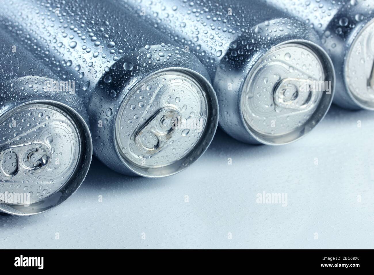 Metal cans of beer, isolated on white Stock Photo - Alamy