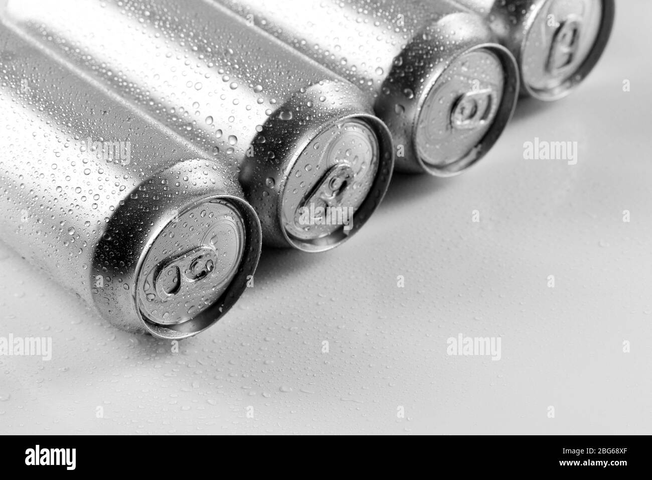 Metal cans of beer, isolated on white Stock Photo - Alamy