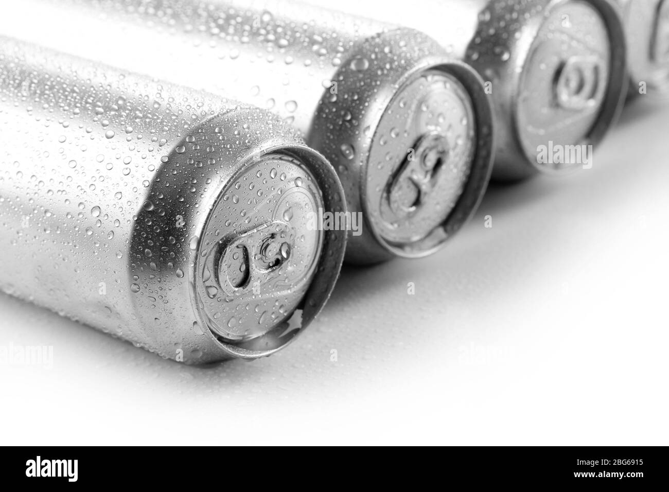 Metal cans of beer, isolated on white Stock Photo - Alamy
