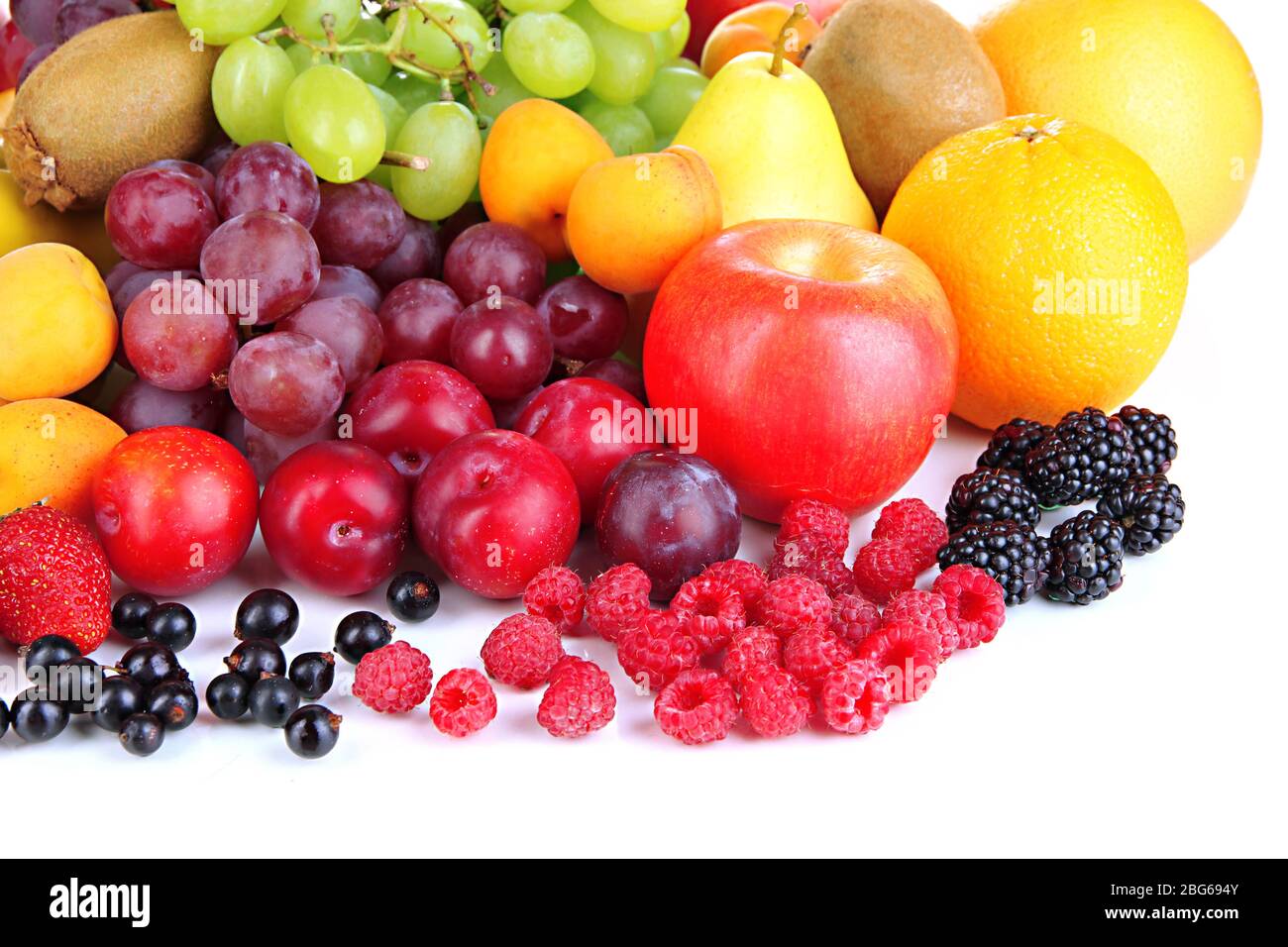Fresh fruits and berries isolated on white Stock Photo - Alamy