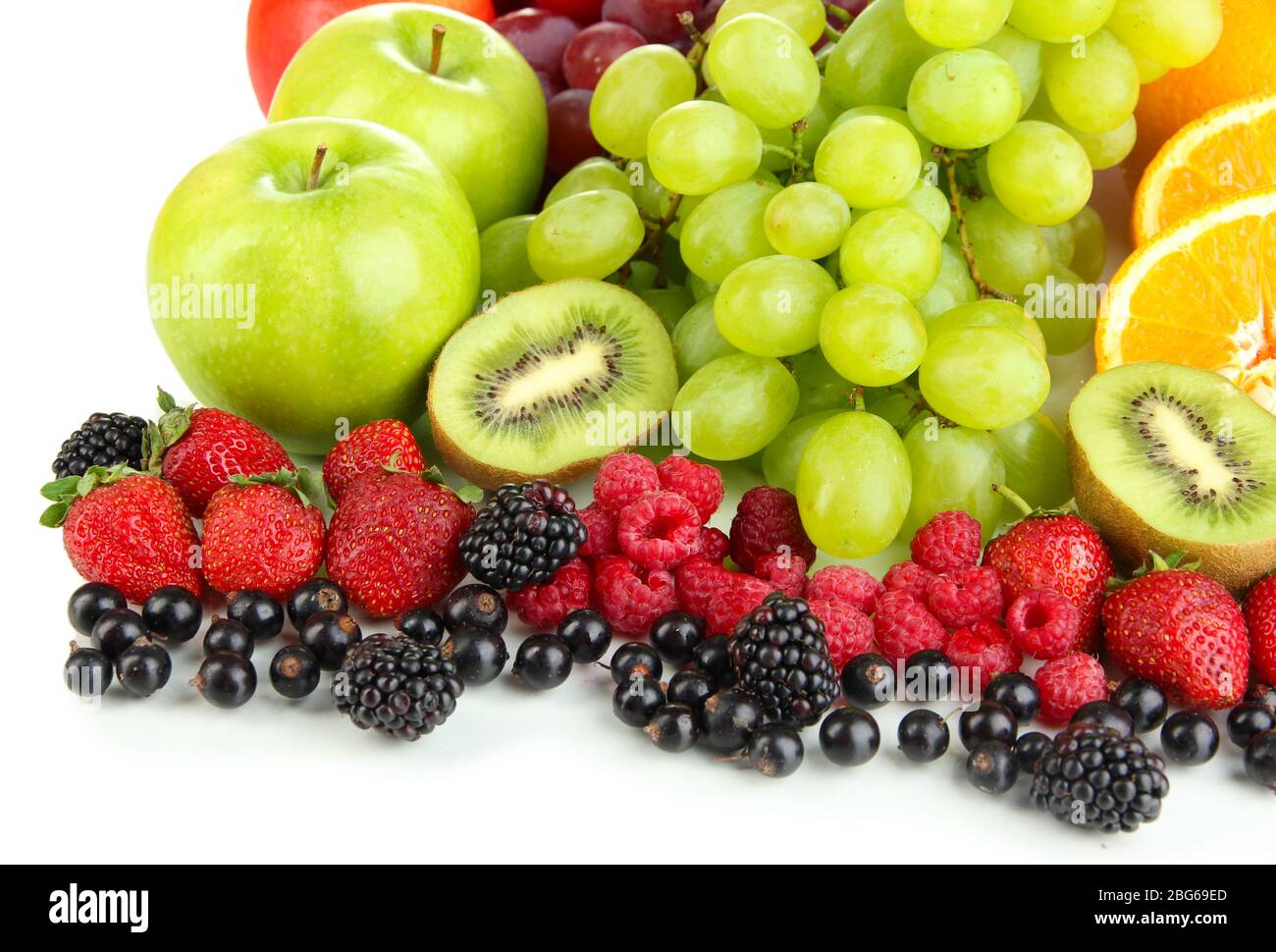Fresh fruits and berries isolated on white Stock Photo - Alamy