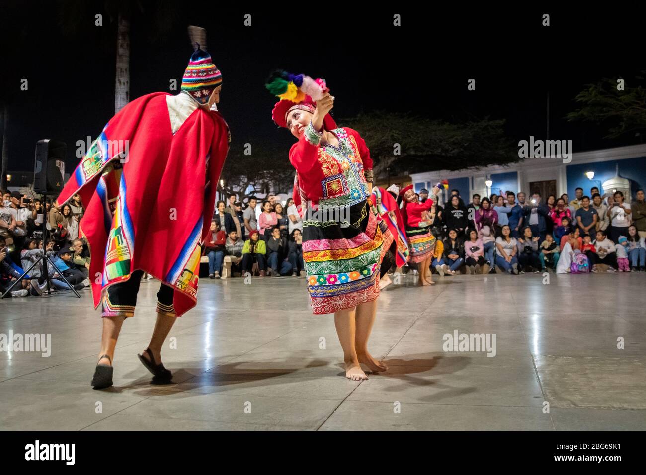 Dancers in colourful costumes performing traditional Huayno Cusqueño ...