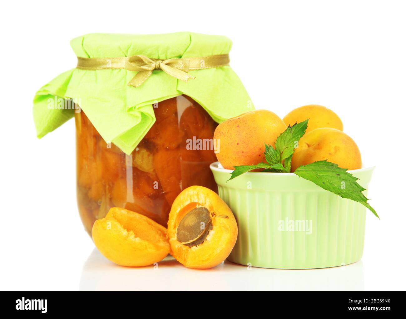 Apricot jam in glass jar and fresh apricots, isolated on white Stock ...