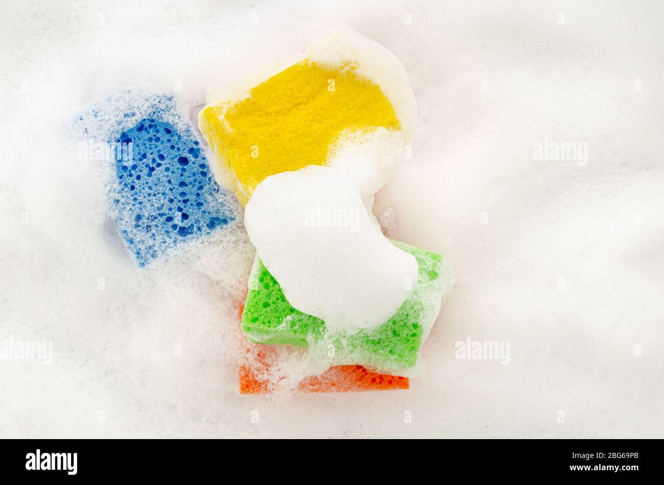 Soapy sponge with foam on white background. Cleaning concept Stock ...