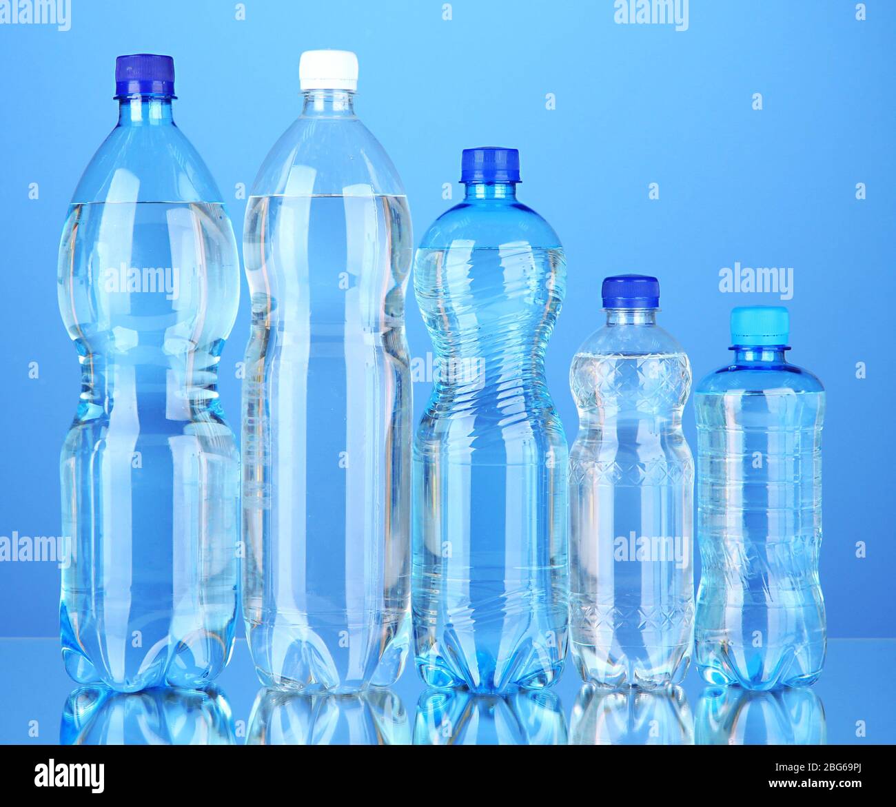 Bottles of water, isolated on white Stock Photo - Alamy Bottles of water, isolated on white Stock Photo - Alamy