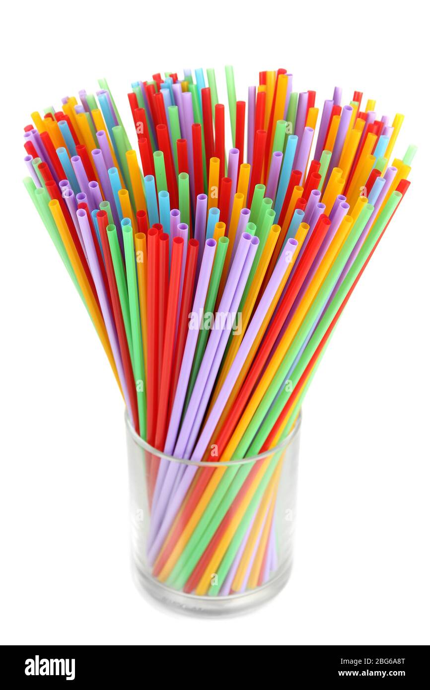 Many straws in glass isolated on white Stock Photo - Alamy