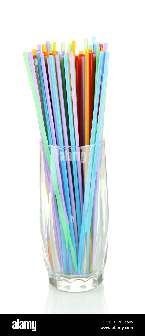 Many straws in glass isolated on white Stock Photo - Alamy