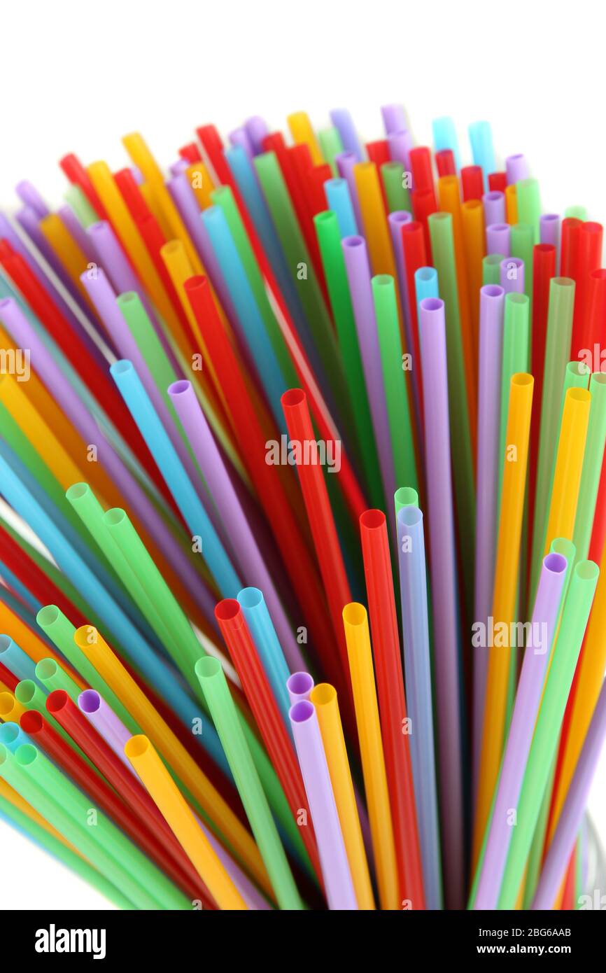 Many straws close-up isolated on white Stock Photo - Alamy