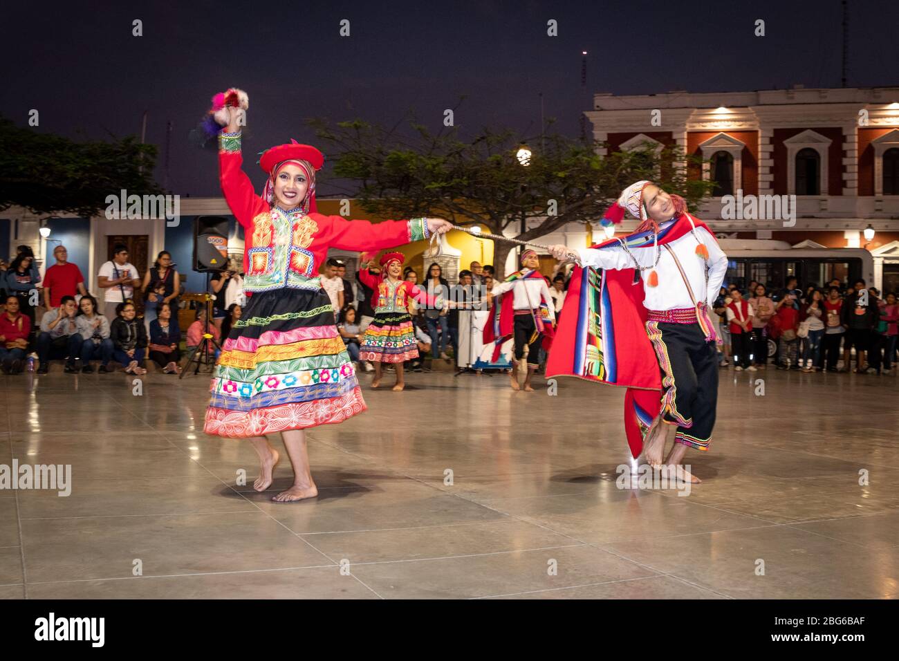 Dancers in colourful costumes performing traditional Huayno Cusqueño ...