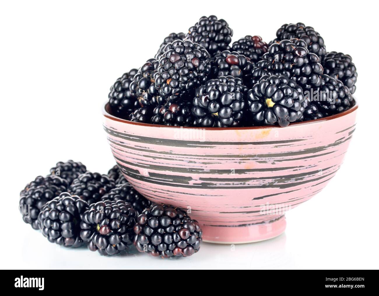 Sweet blackberries in bowl isolate on white Stock Photo - Alamy