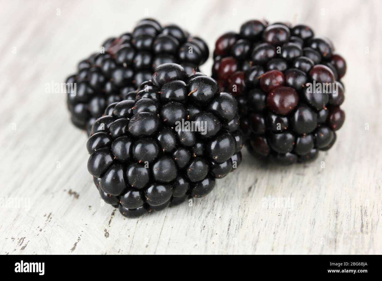 Sweet blackberries on table close-up Stock Photo - Alamy