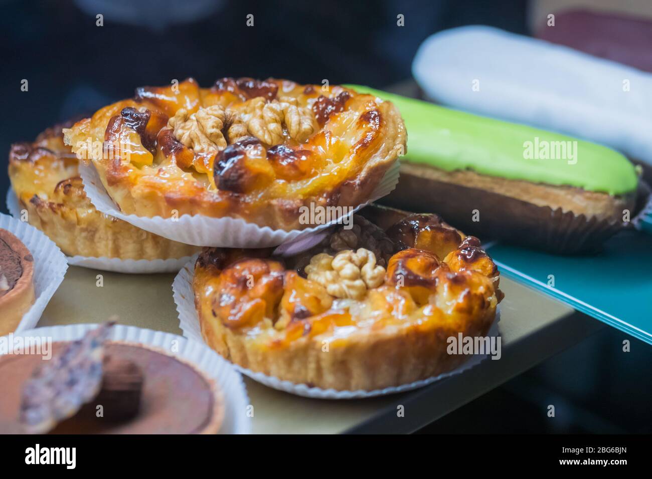 Delicious fresh shortcrust tart cakes with cream and walnut Stock Photo ...