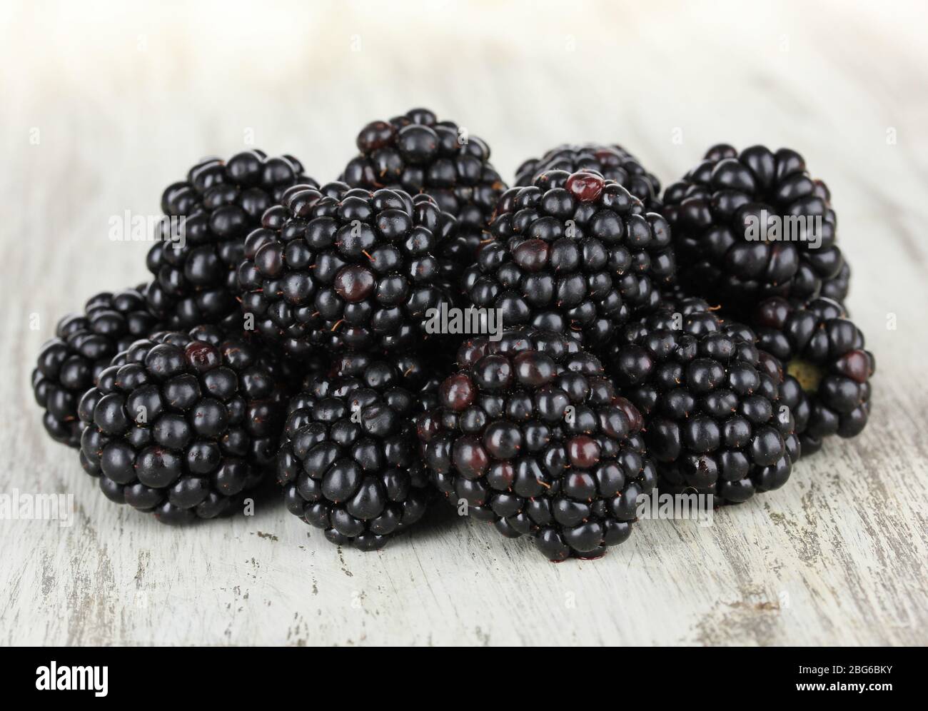 Sweet blackberries on table close-up Stock Photo - Alamy