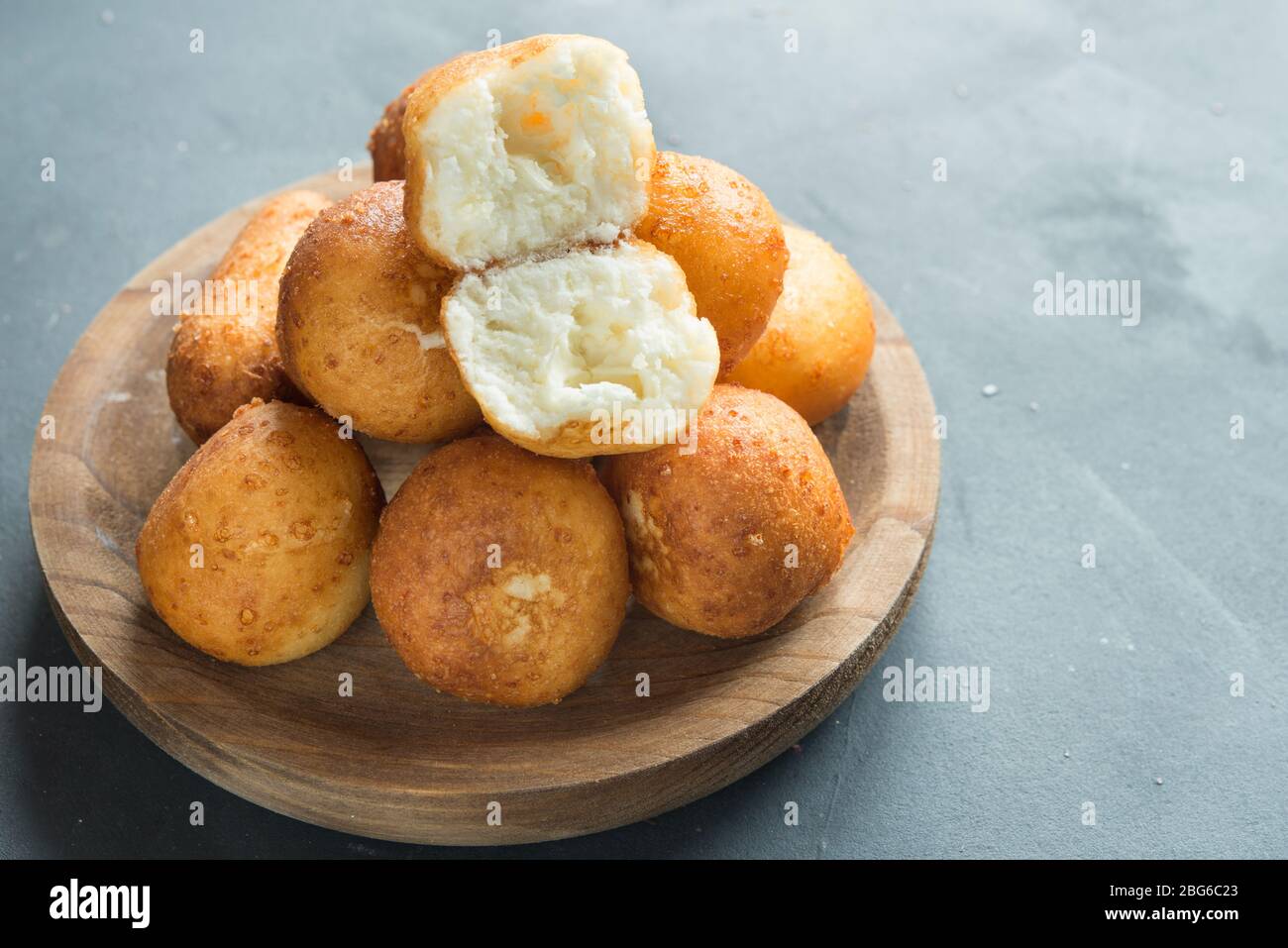 Traditional Colombian buñuelo - Deep Fried Cheese Bread Stock Photo - Alamy