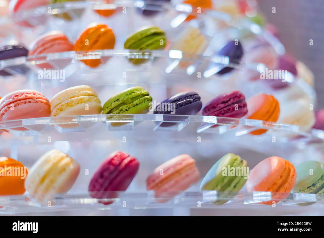 Colorful macarons for sale on counter of candy shop Stock Photo - Alamy