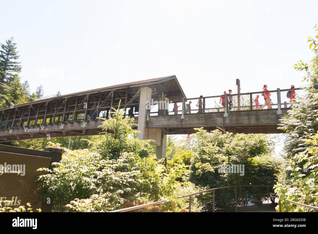 People crossing brdige Stock Photo - Alamy