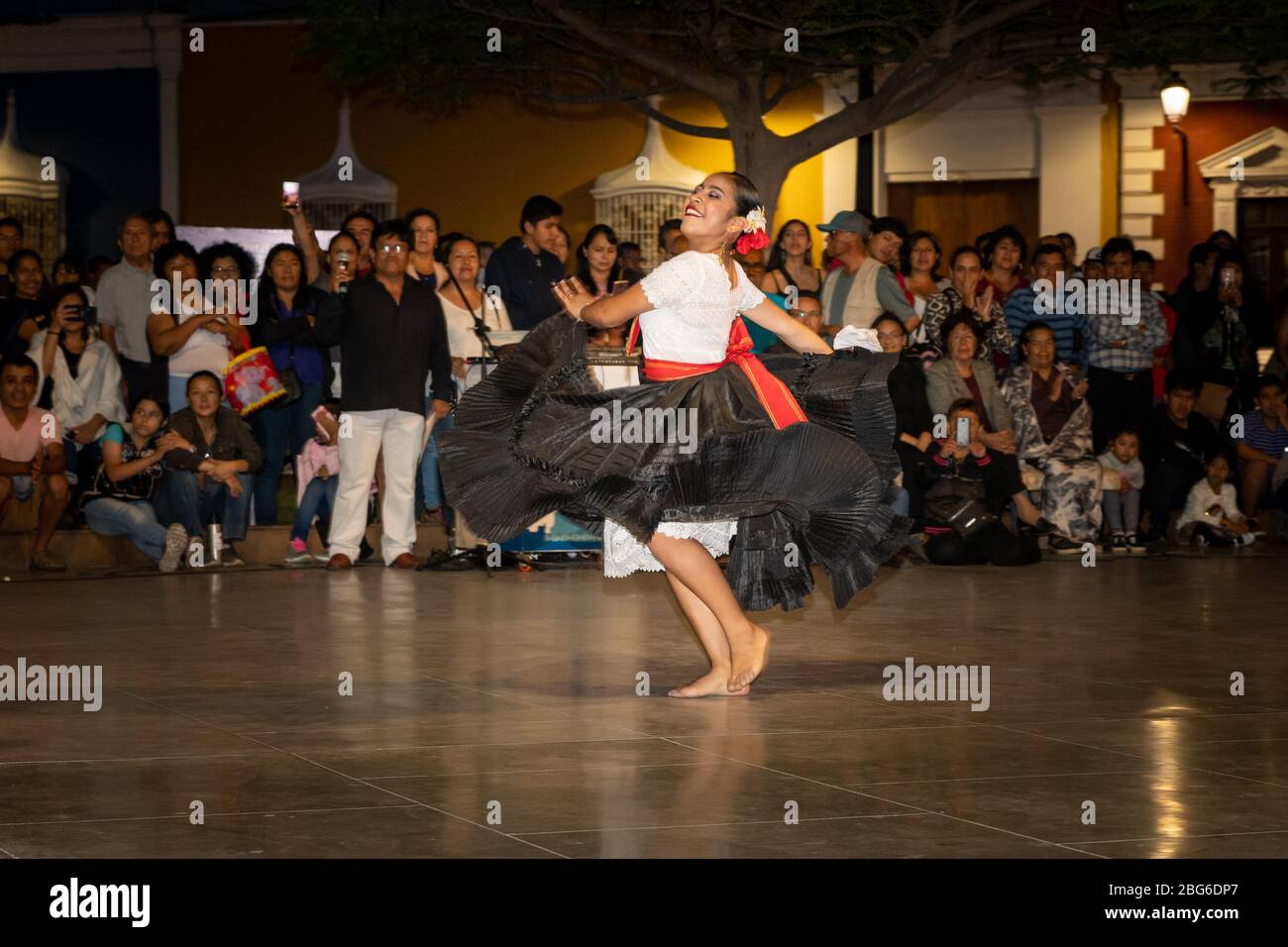 Male and Female dancers in traditional costume performing La Marinera ...