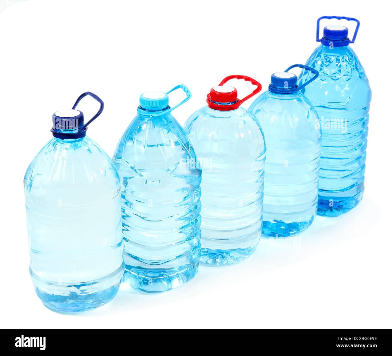 Water in big bottles isolated on white Stock Photo - Alamy