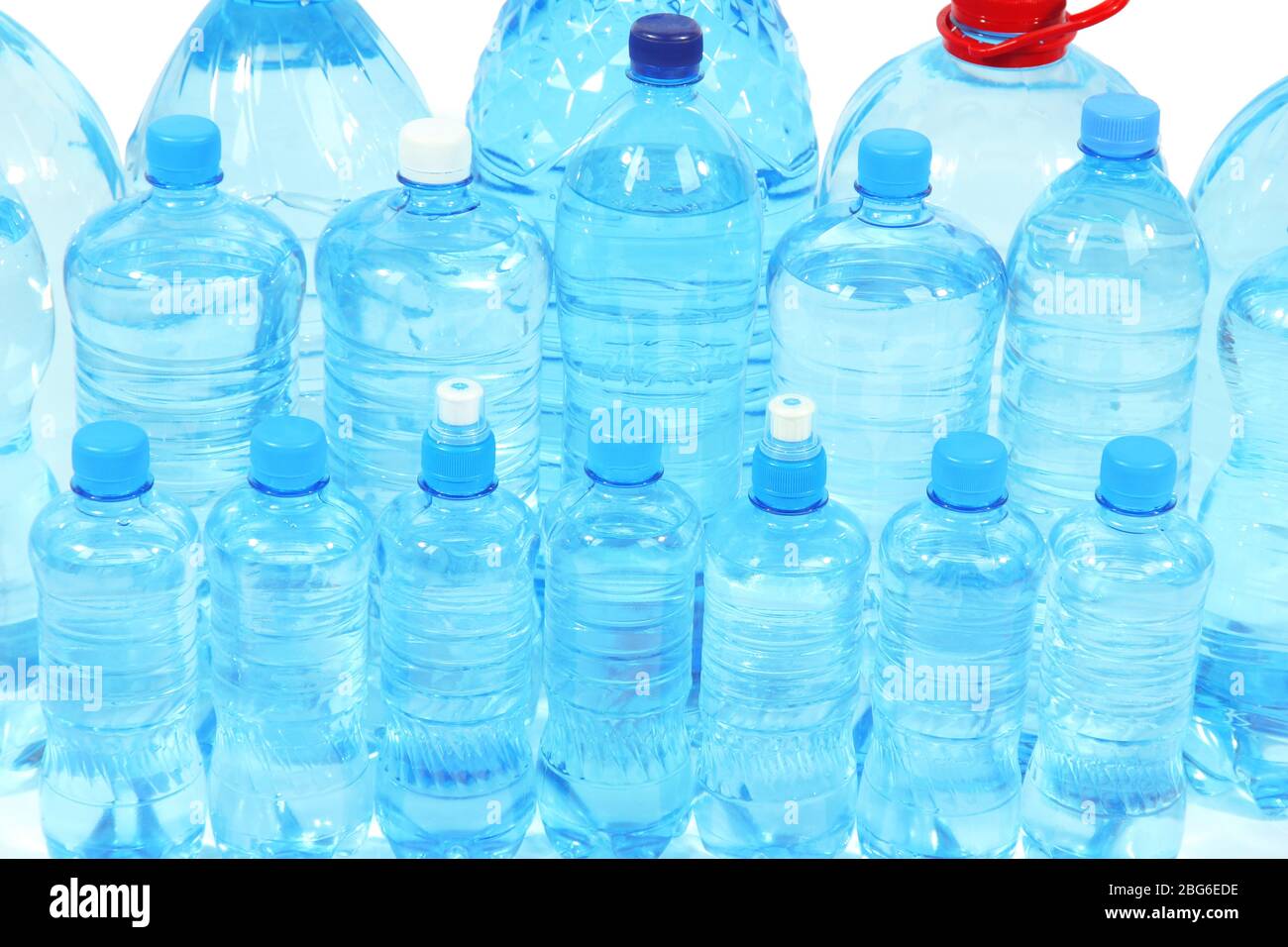 Water in different bottles isolated on white Stock Photo - Alamy