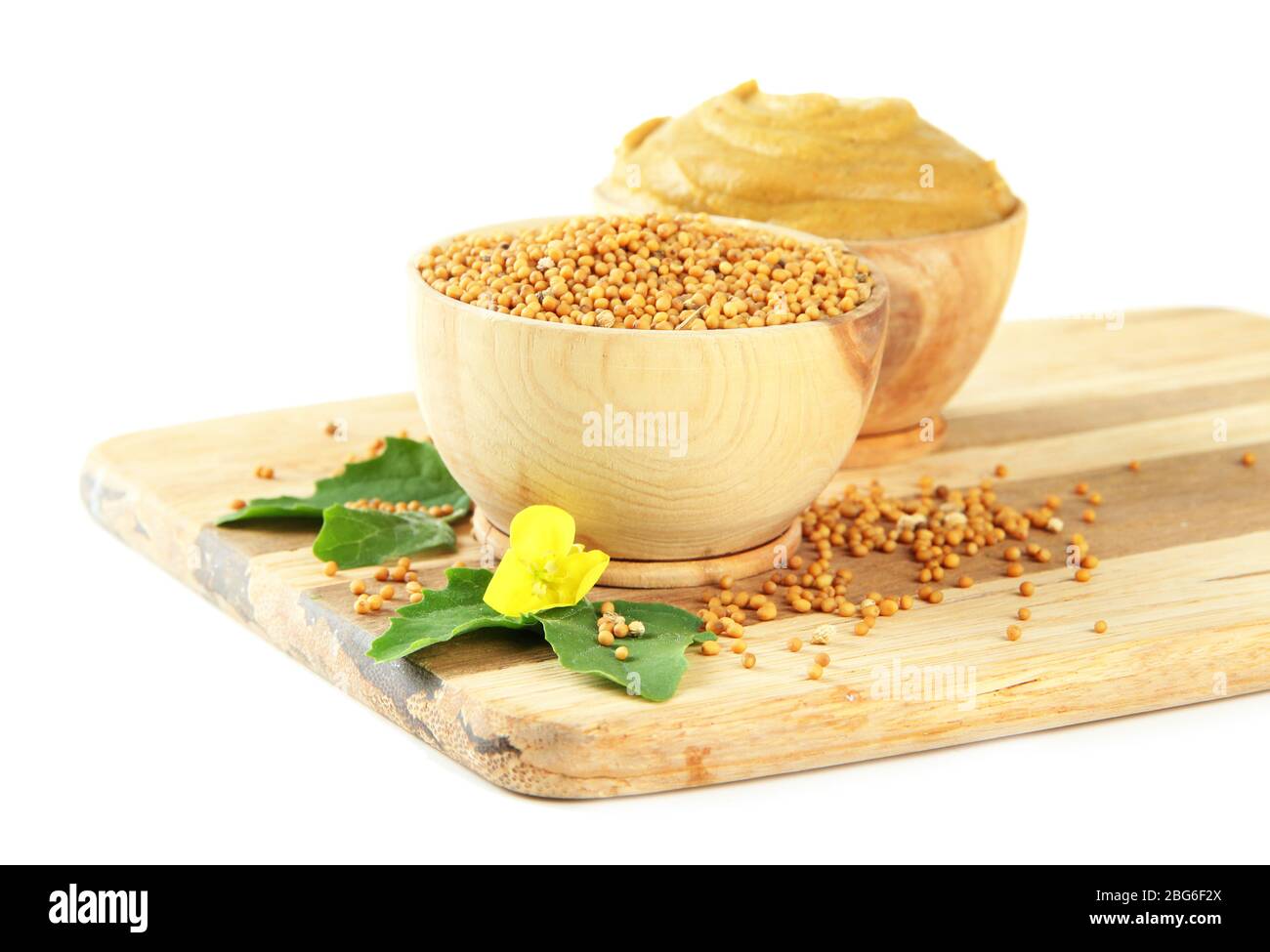 Mustard with seeds and mustard flower isolated on white Stock Photo - Alamy