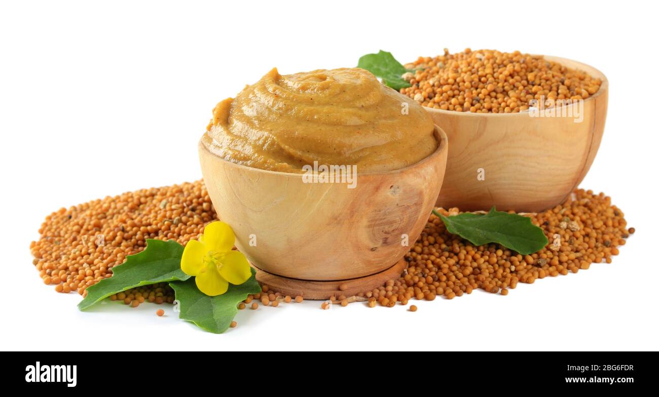 Mustard with seeds and mustard flower isolated on white Stock Photo - Alamy