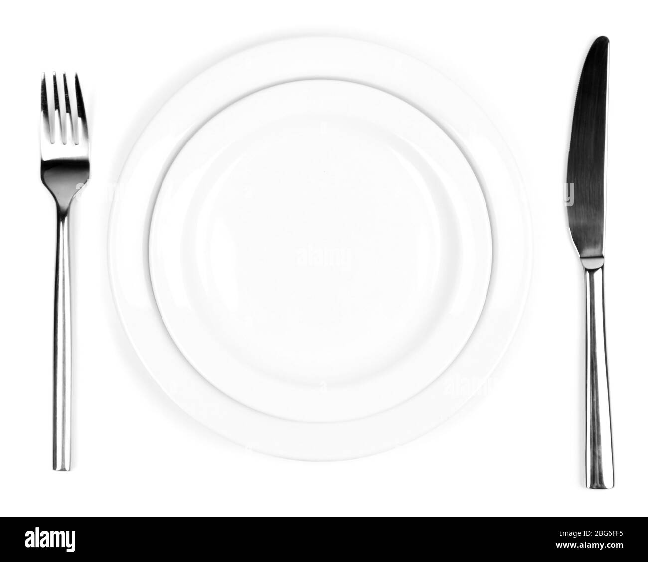 Knife, color plate and fork, isolated on white Stock Photo - Alamy