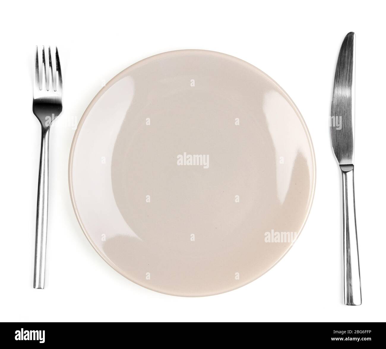 Knife, color plate and fork, isolated on white Stock Photo - Alamy
