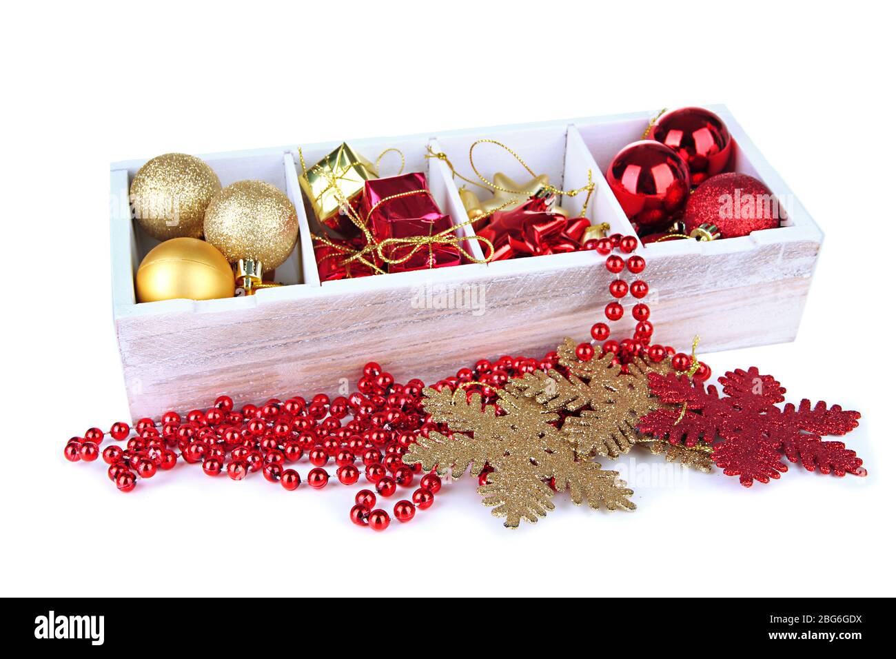 Wooden box filled with christmas decorations, isolated on white Stock ...