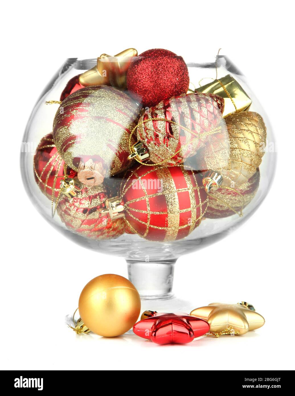 Glass bowl filled with christmas decorations, isolated on white Stock ...