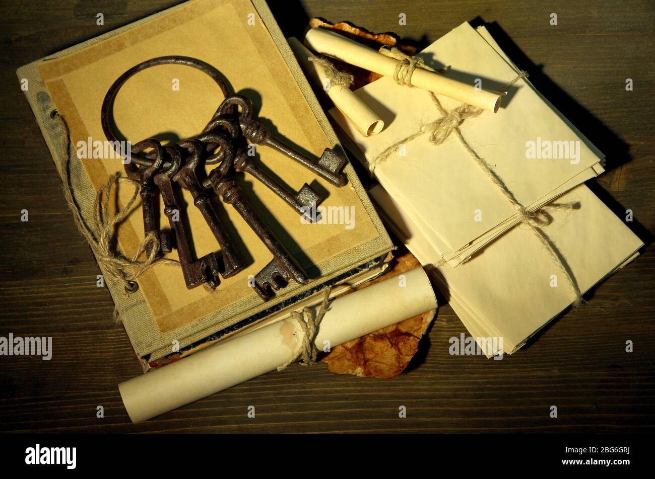 Antique keys, letters and book, on dark background Stock Photo - Alamy