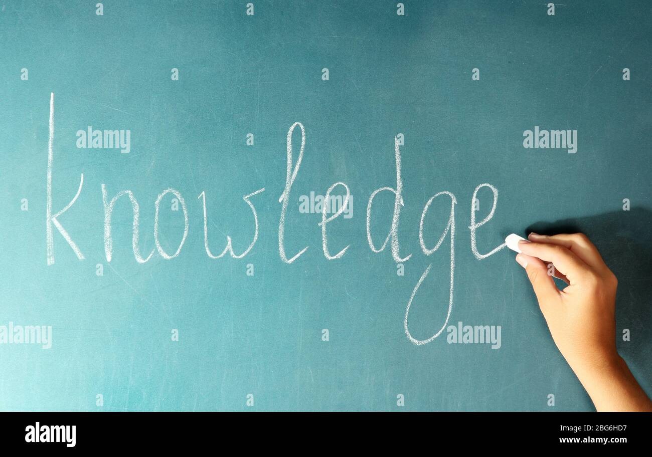 Writing on blackboard Stock Photo - Alamy