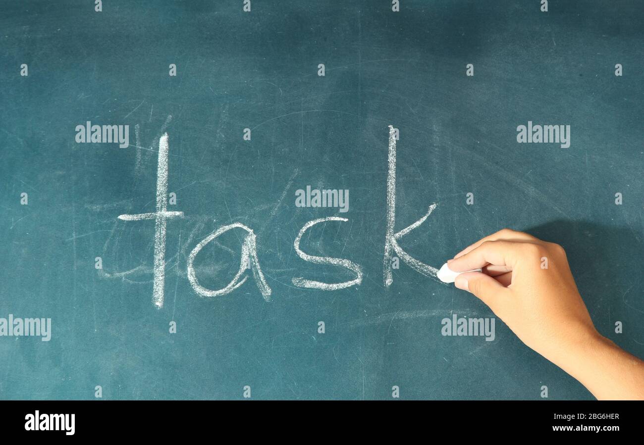 Writing on blackboard Stock Photo - Alamy