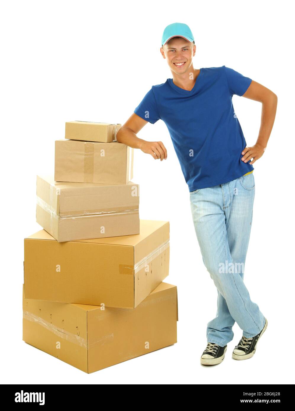 Young delivery man with parcels, isolated on white Stock Photo - Alamy