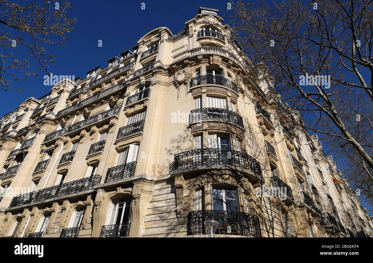 Traditional French house with typical balconies and windows. Paris ...