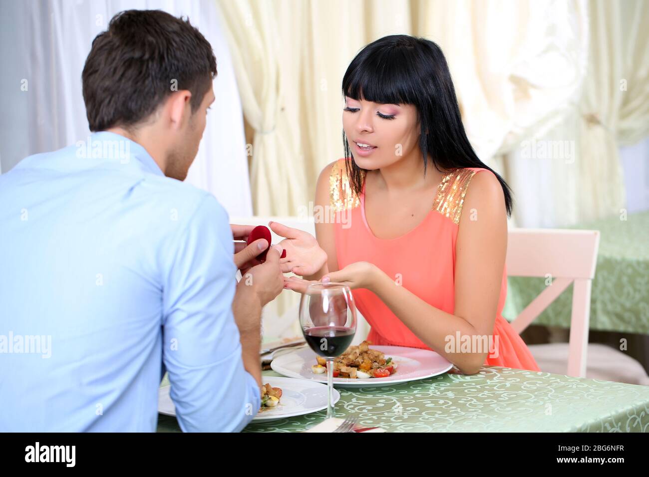 Man proposing engagement ring his woman over restaurant table Stock ...