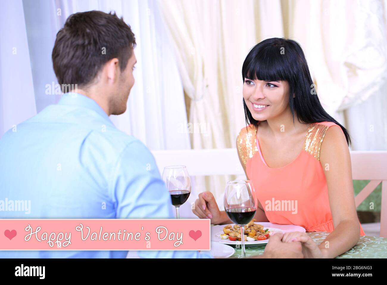 Beautiful couple having romantic dinner at restaurant Stock Photo - Alamy